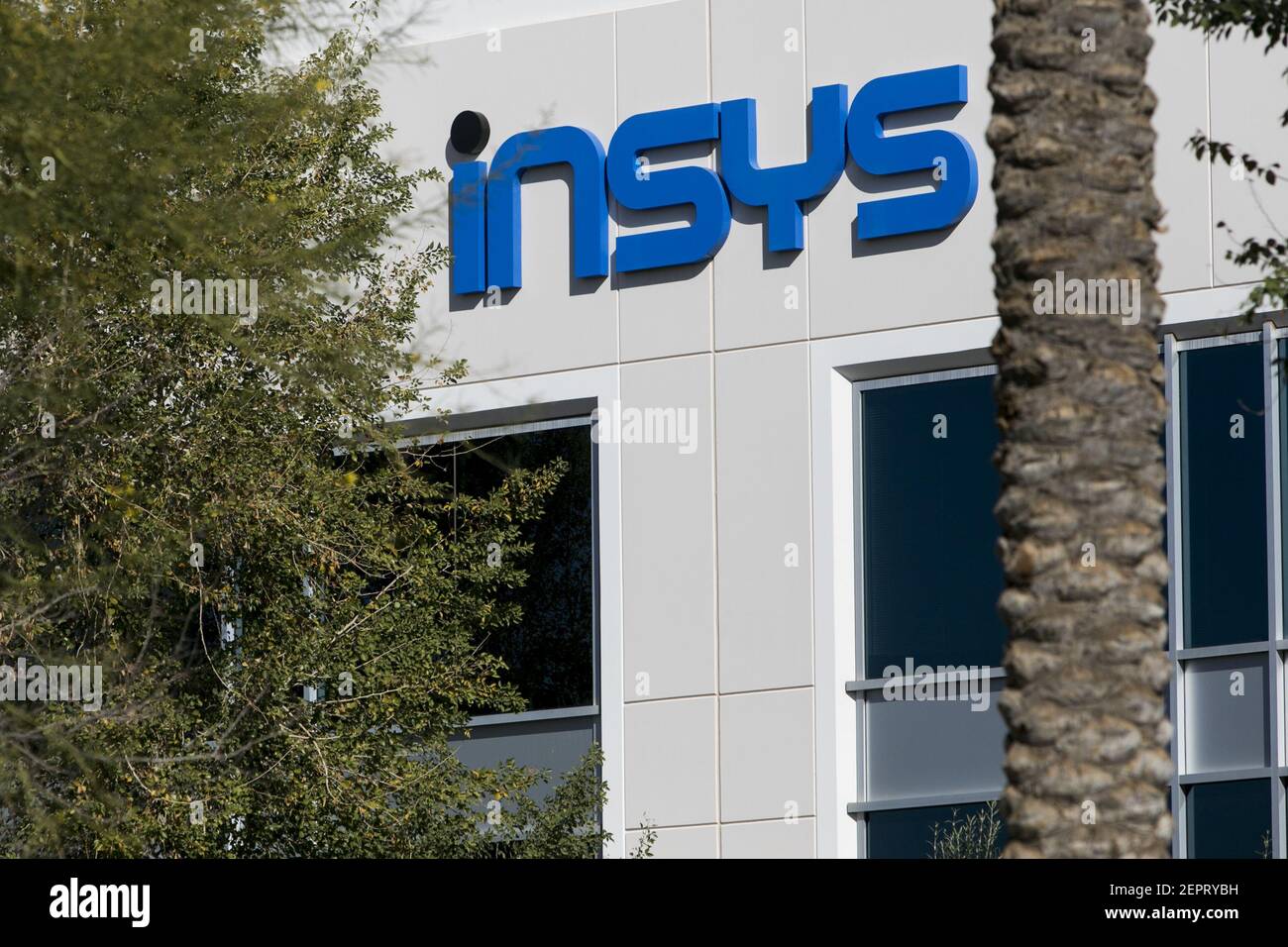 A logo sign outside of the headquarters of Insys Therapeutics in ...