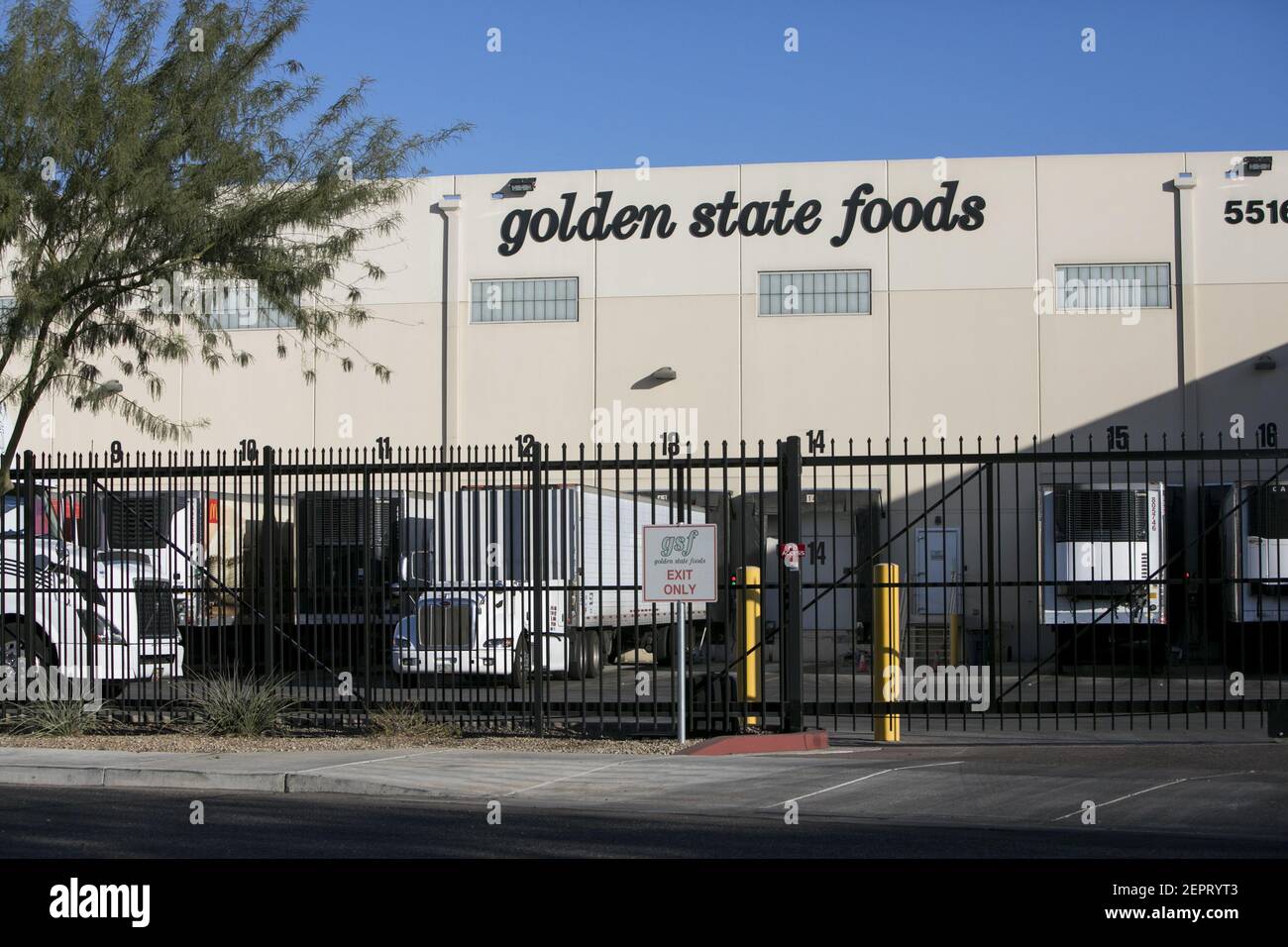 A logo sign outside of a facility occupied by Golden State Foods in ...