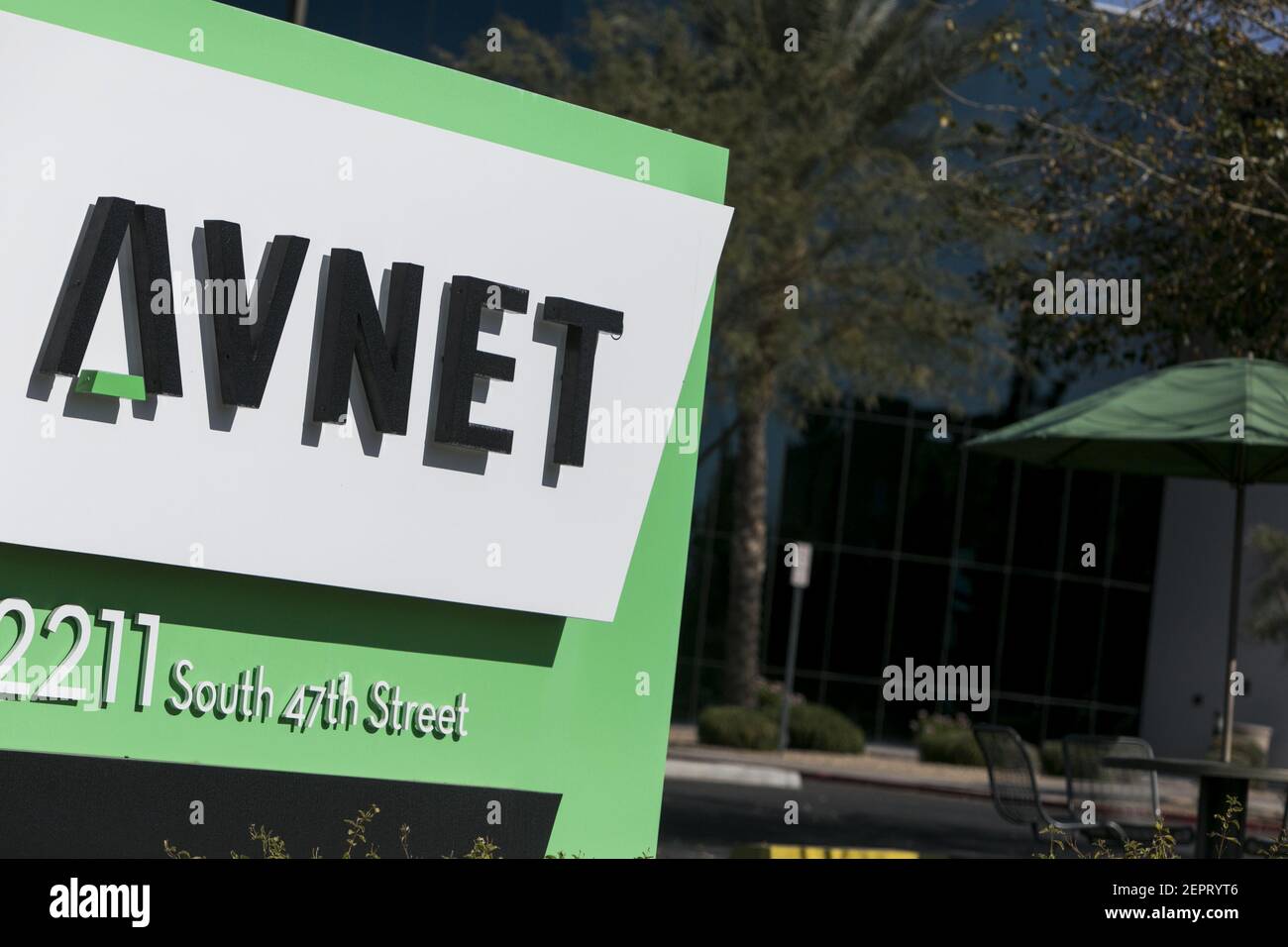 A logo sign outside of the headquarters of Avnet, Inc., in Phoenix ...