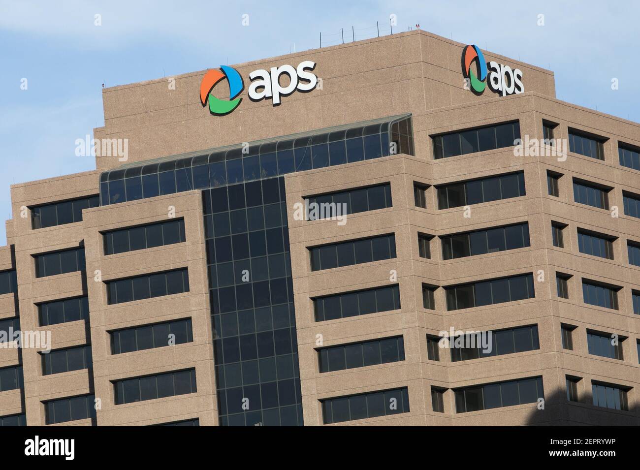 A logo sign outside of the headquarters of Arizona Public Service (APS ...