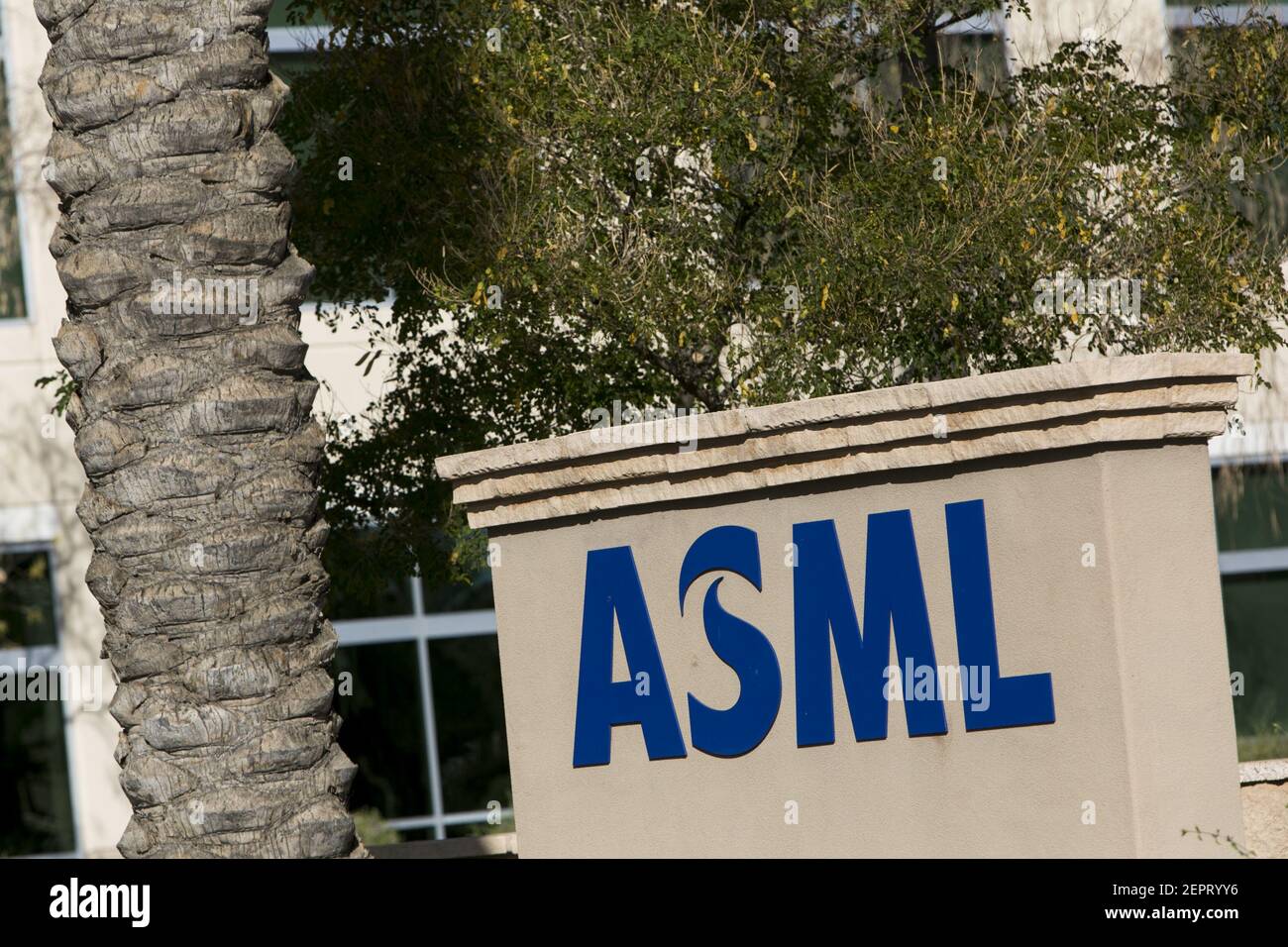 A logo sign outside of a facility occupied by ASML in Chandler, Arizona ...