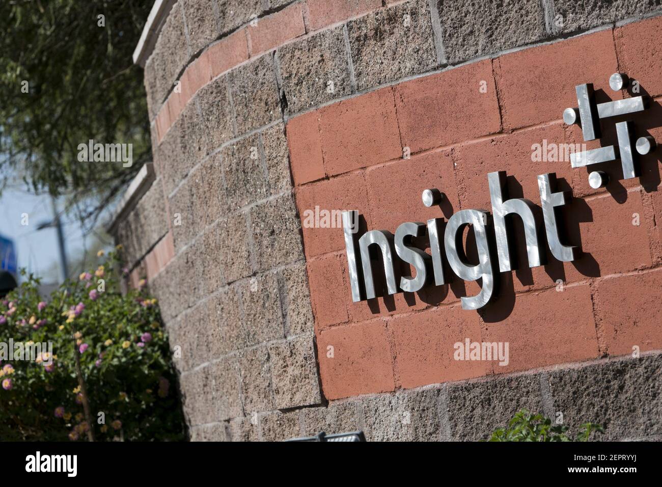 A logo sign outside of the headquarters of Insight Enterprises in Tempe ...