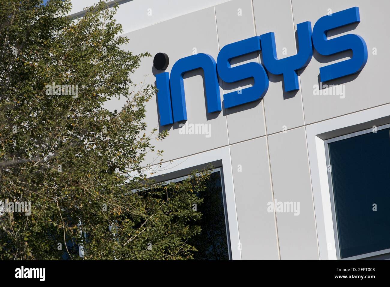 A logo sign outside of the headquarters of Insys Therapeutics in ...