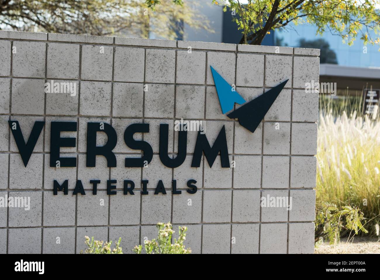 A logo sign outside of a the headquarters of Versum Materials in Tempe ...