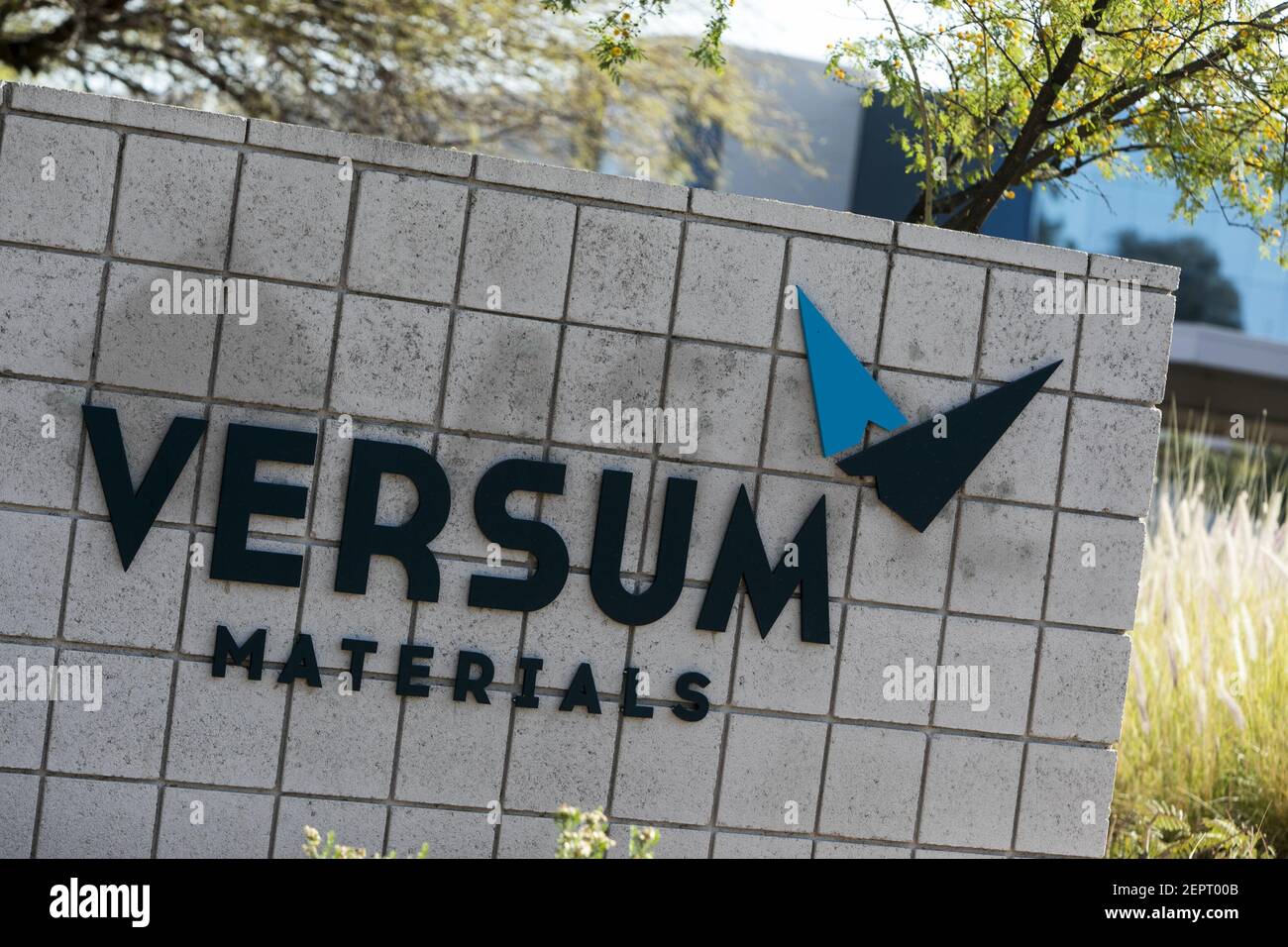 A logo sign outside of a the headquarters of Versum Materials in Tempe ...