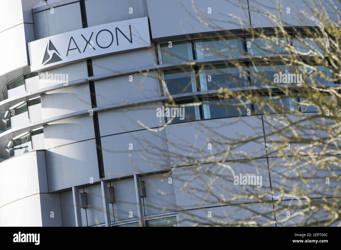 A logo sign outside of the headquarters of Axon in Scottsdale, Arizona ...