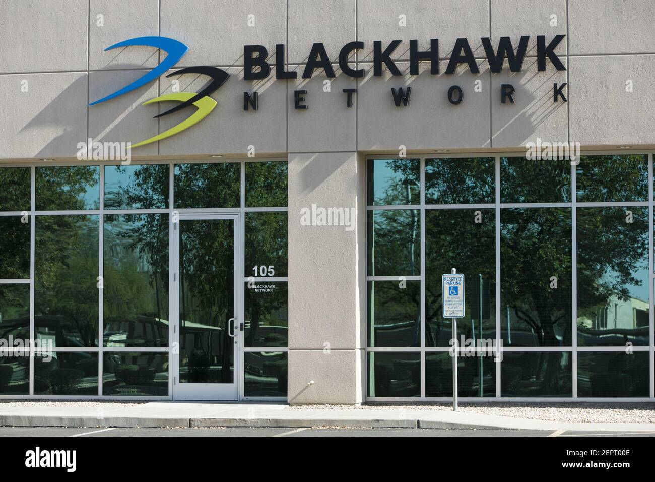 A logo sign outside of a facility occupied by Blackhawk Network in ...