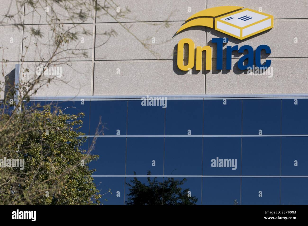 A logo sign outside of the headquarters of OnTrac in Chandler, Arizona ...