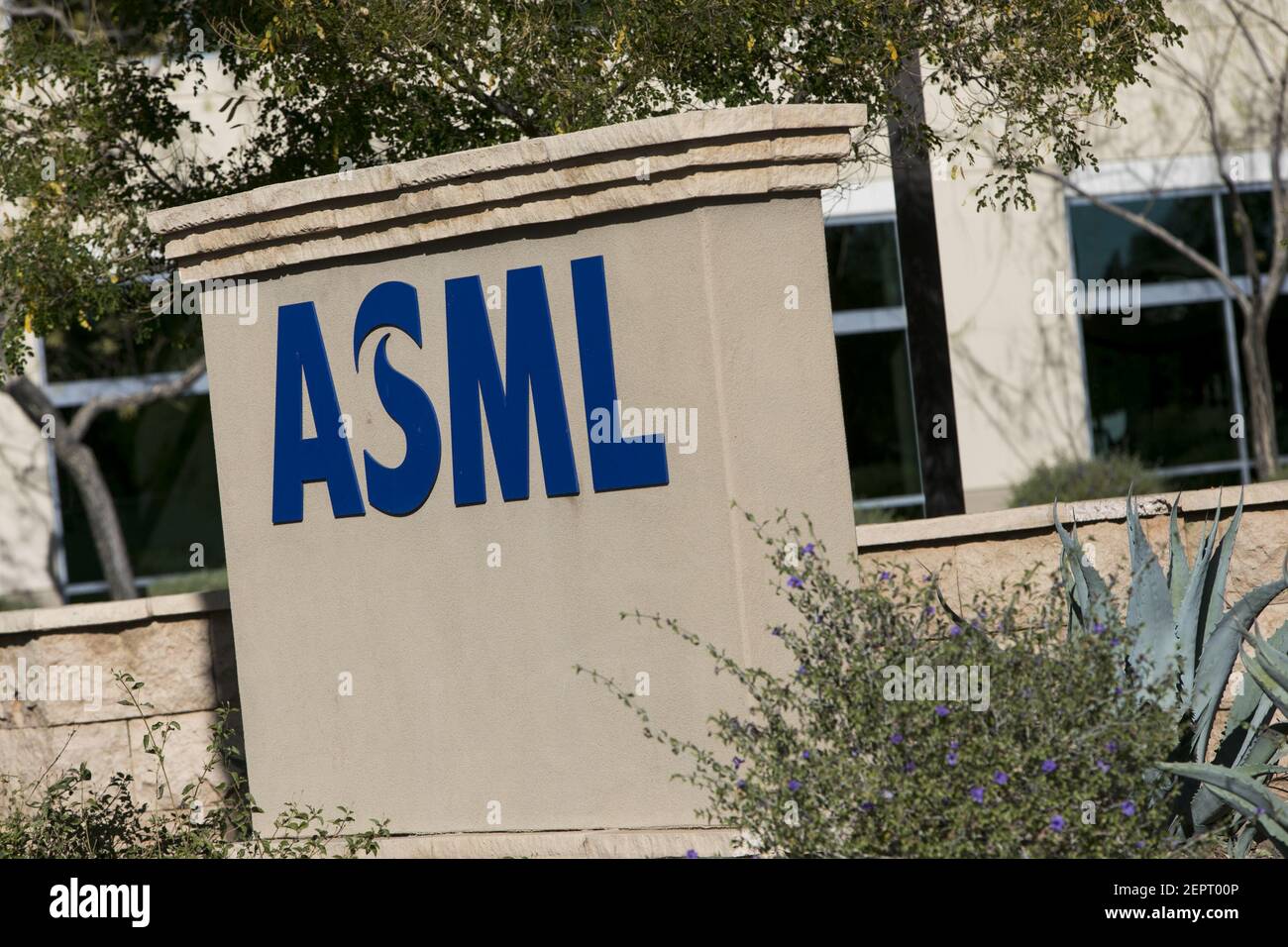 A logo sign outside of a facility occupied by ASML in Chandler, Arizona ...