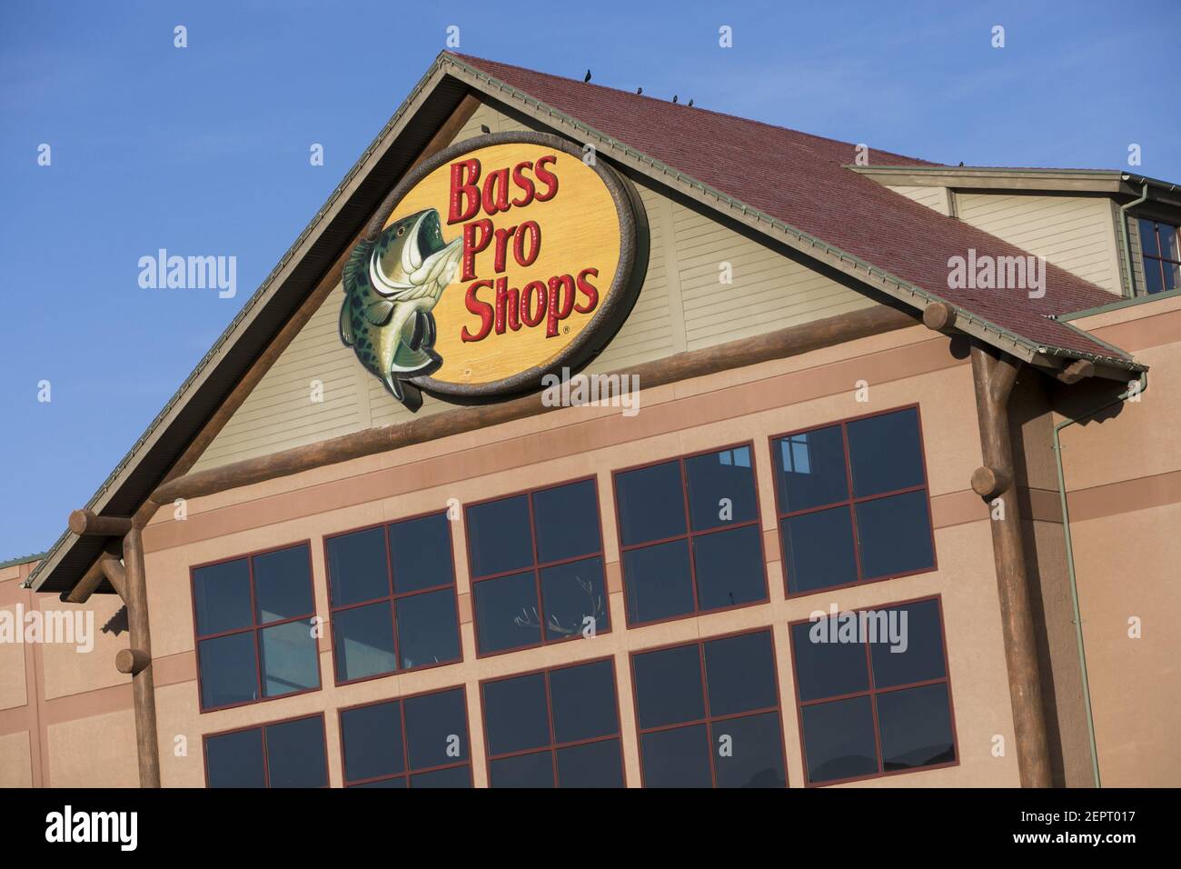 A logo sign outside of a Bass Pro Shops retail store in Mesa, Arizona ...
