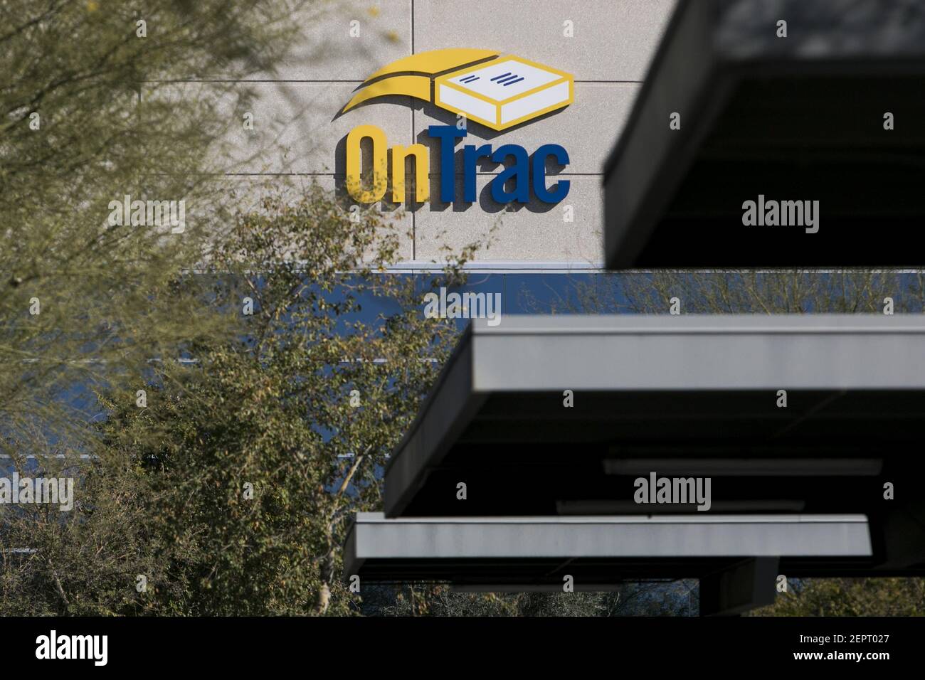 A logo sign outside of the headquarters of OnTrac in Chandler, Arizona ...