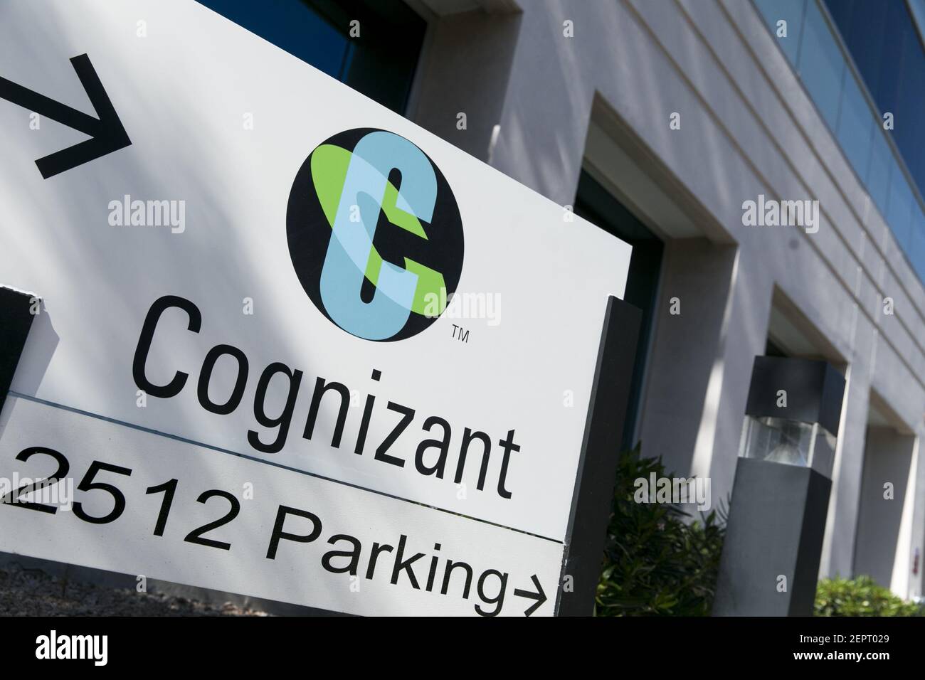 A logo sign outside of a facility occupied by Cognizant in Phoenix ...