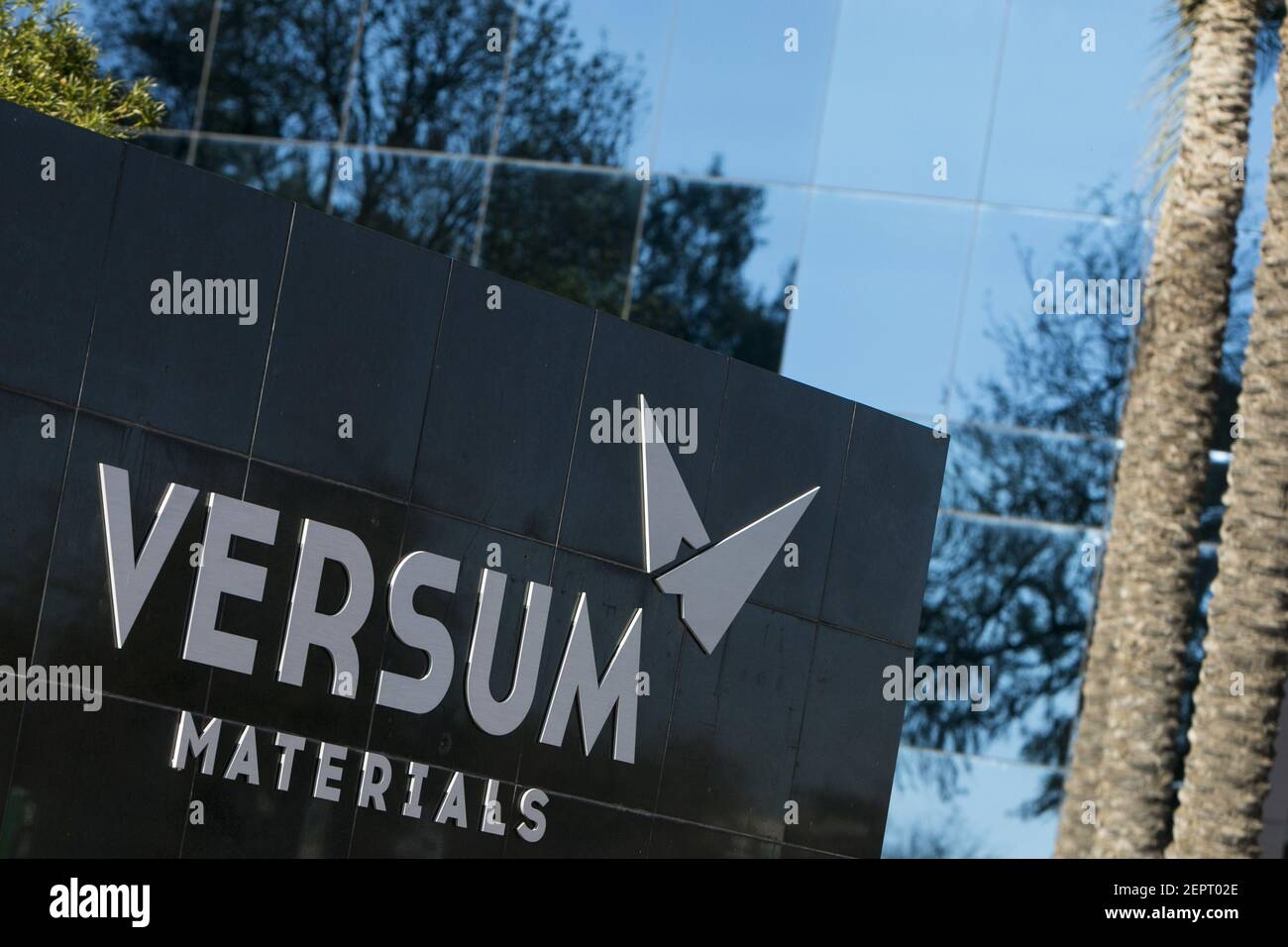 A logo sign outside of a the headquarters of Versum Materials in Tempe ...