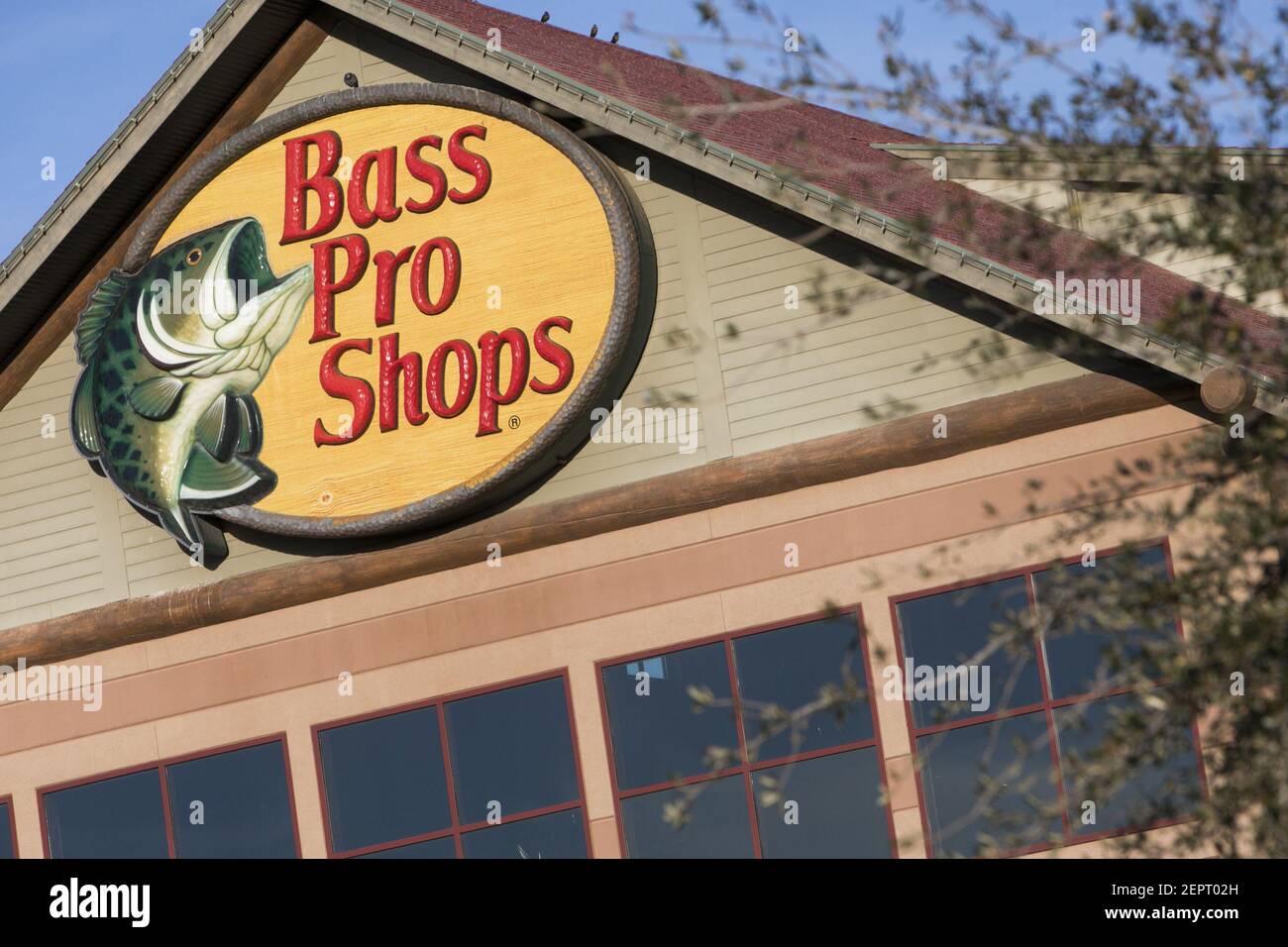 A logo sign outside of a Bass Pro Shops retail store in Mesa, Arizona ...