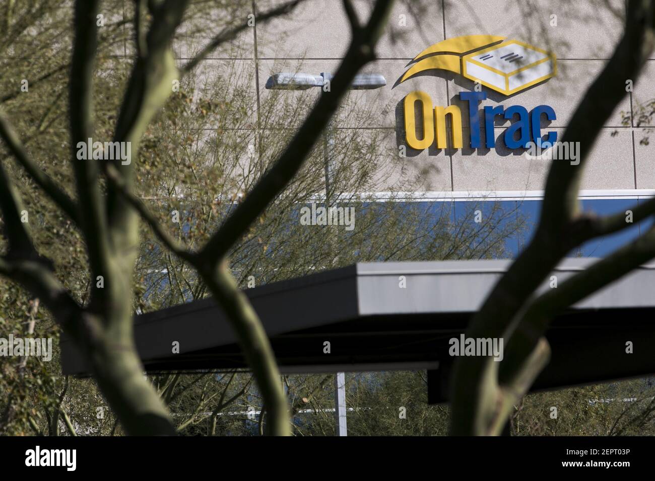 A logo sign outside of the headquarters of OnTrac in Chandler, Arizona ...