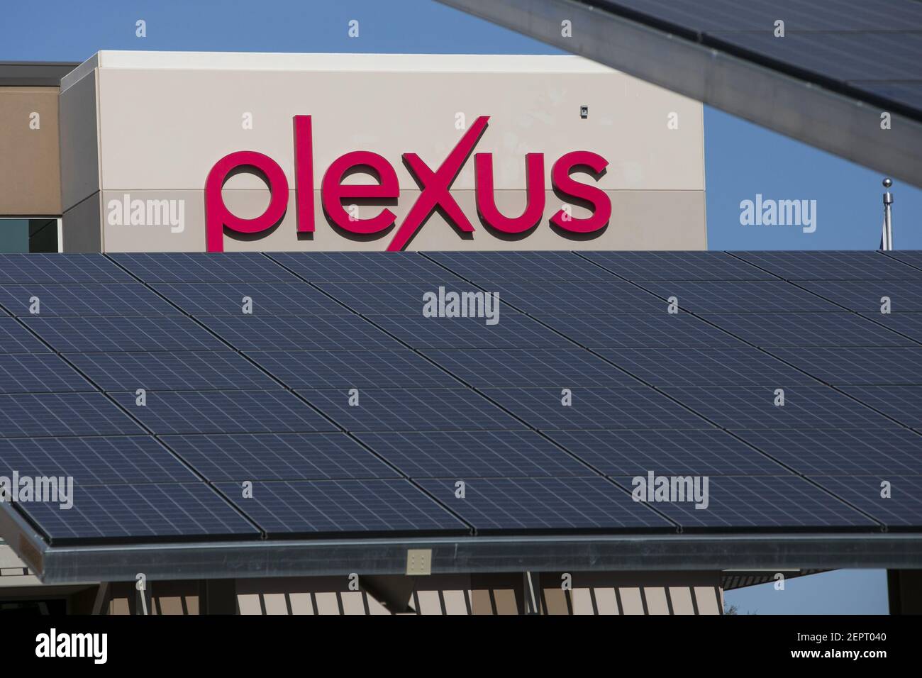 A logo sign outside of the headquarters of Plexus Worldwide in ...