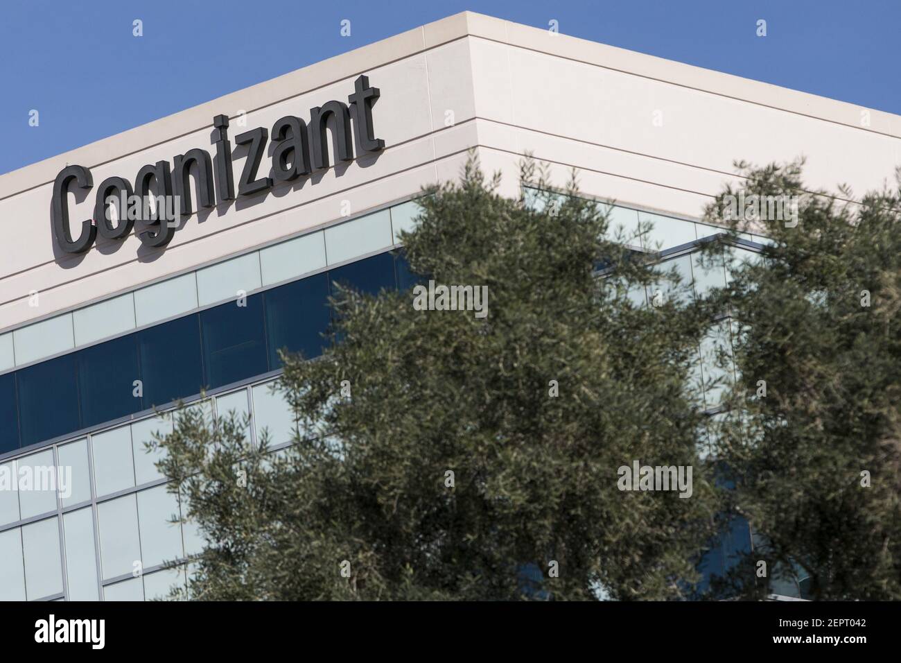 A logo sign outside of a facility occupied by Cognizant in Phoenix ...