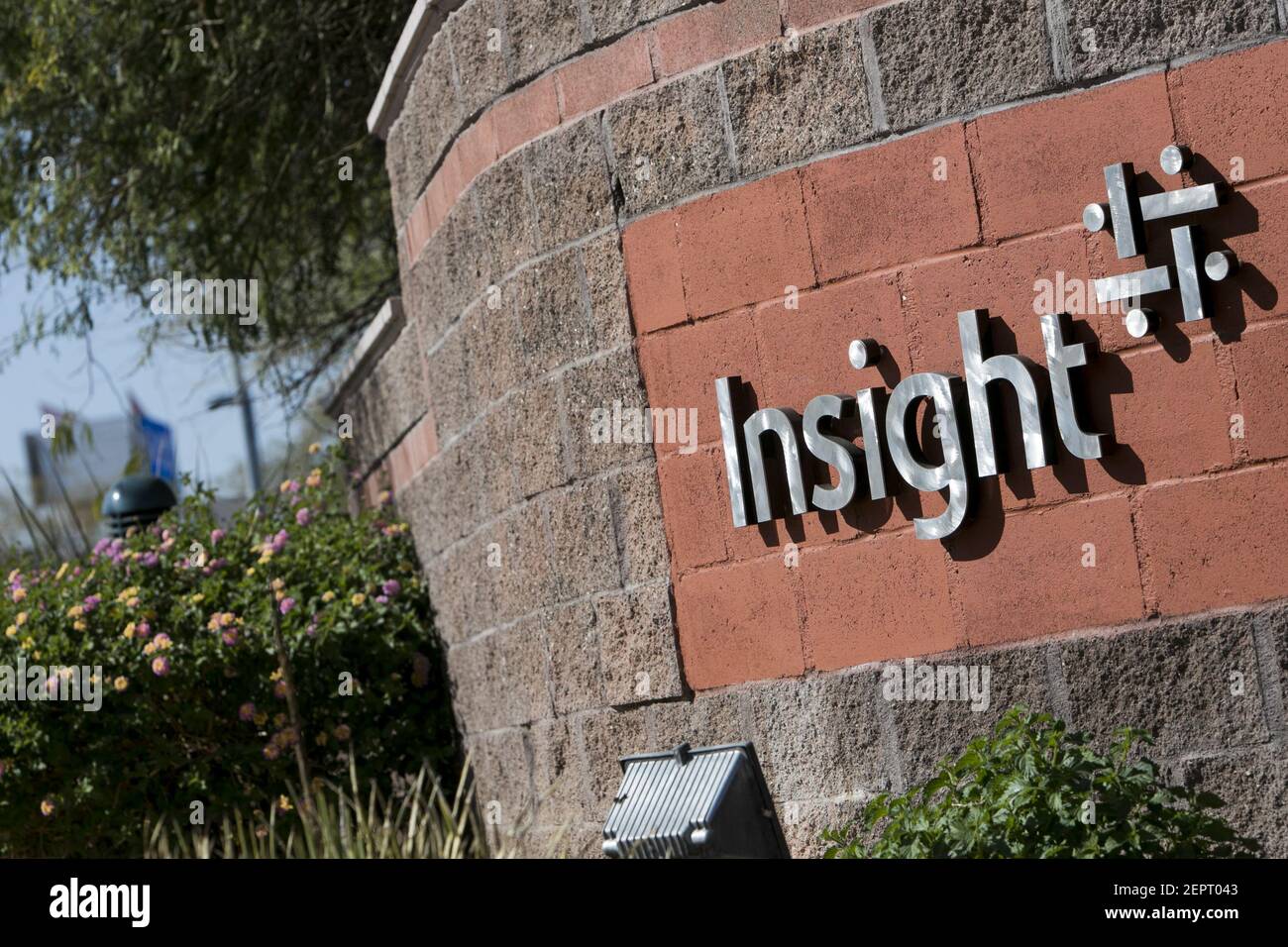 A logo sign outside of the headquarters of Insight Enterprises in Tempe ...