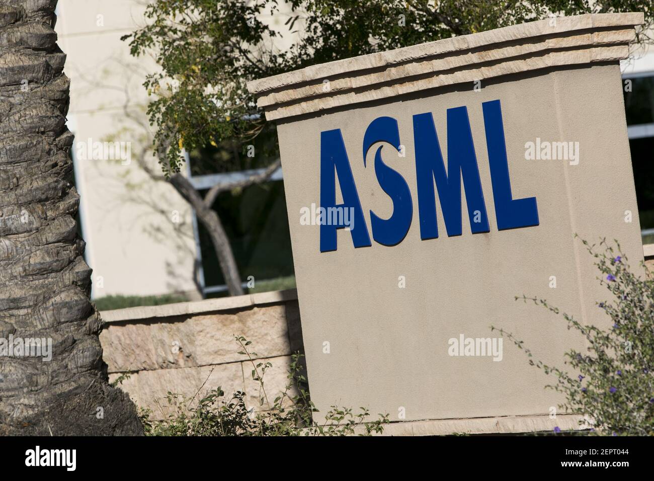 A logo sign outside of a facility occupied by ASML in Chandler, Arizona ...