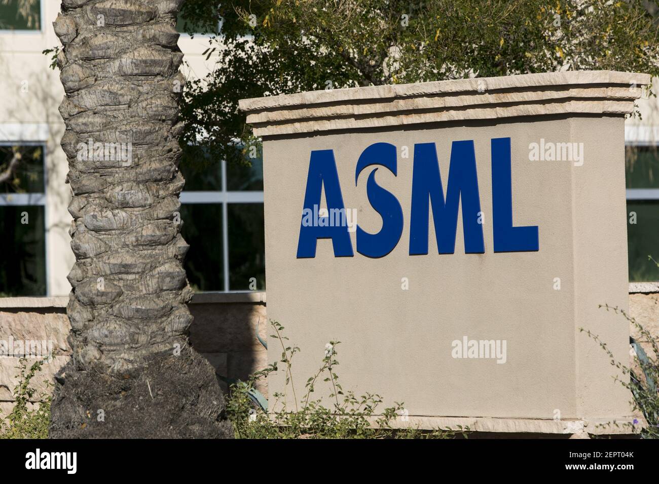 A logo sign outside of a facility occupied by ASML in Chandler, Arizona ...