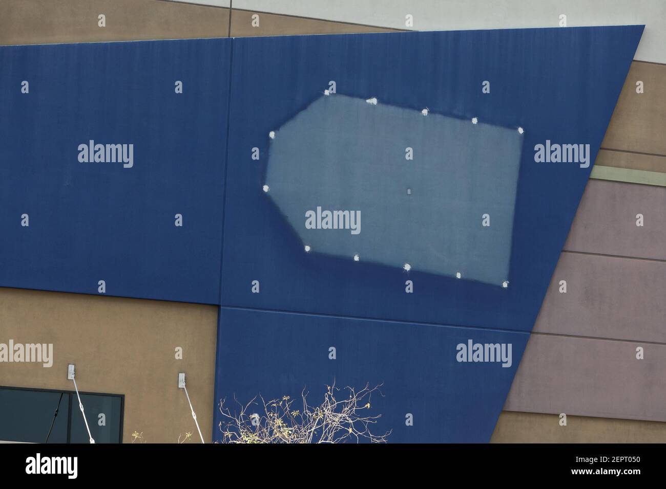 The faded outline of a logo sign outside of a now closed Best Buy Co ...