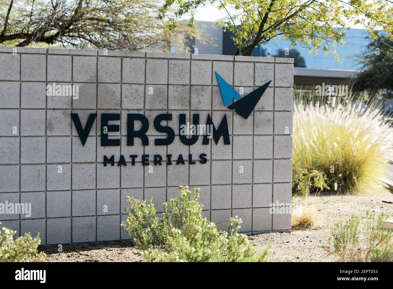 A logo sign outside of a the headquarters of Versum Materials in Tempe ...