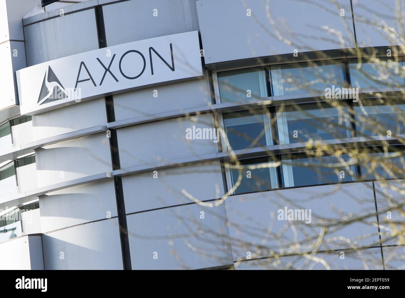 A logo sign outside of the headquarters of Axon in Scottsdale, Arizona ...