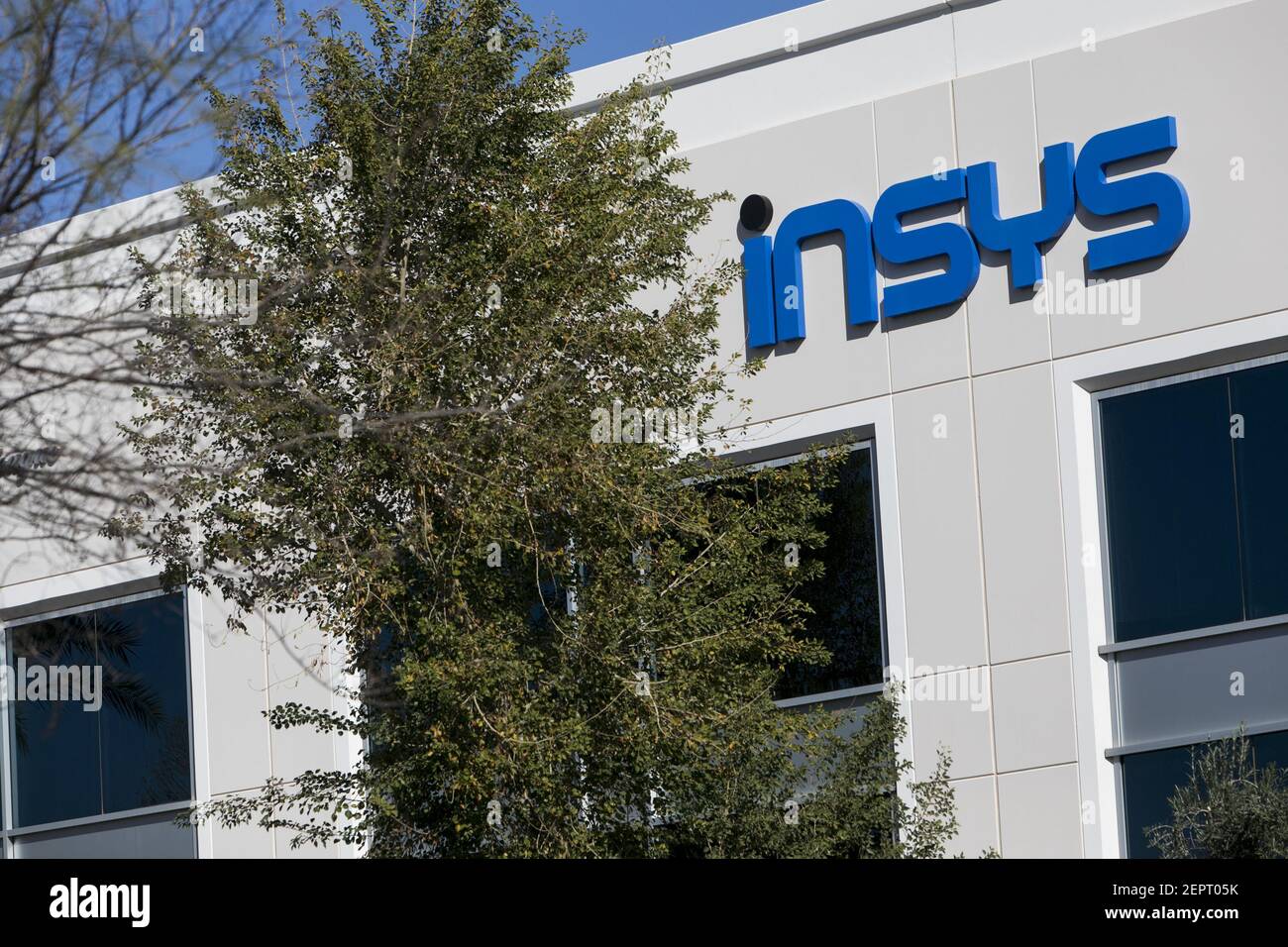 A logo sign outside of the headquarters of Insys Therapeutics in ...