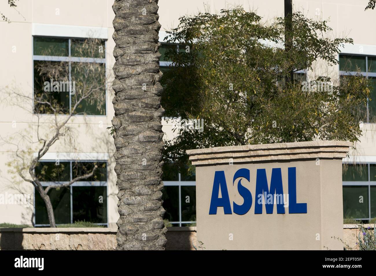 A logo sign outside of a facility occupied by ASML in Chandler, Arizona ...