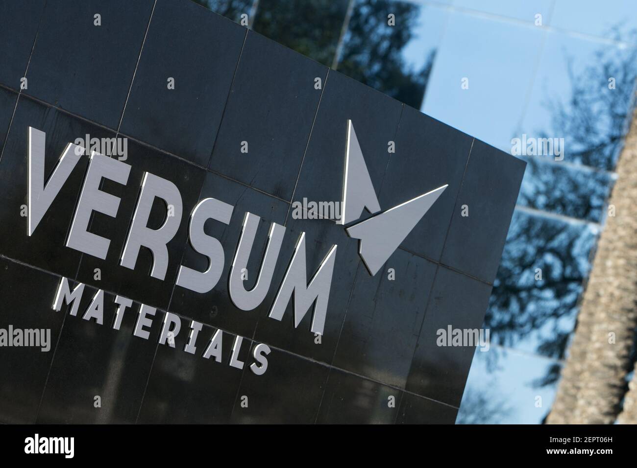 A logo sign outside of a the headquarters of Versum Materials in Tempe ...
