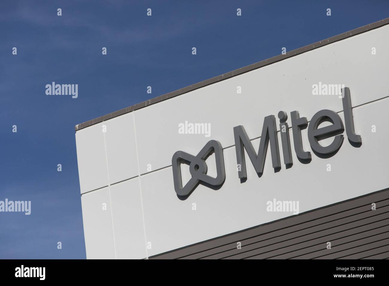 A logo sign outside of a facility occupied by Mitel Networks in Mesa ...