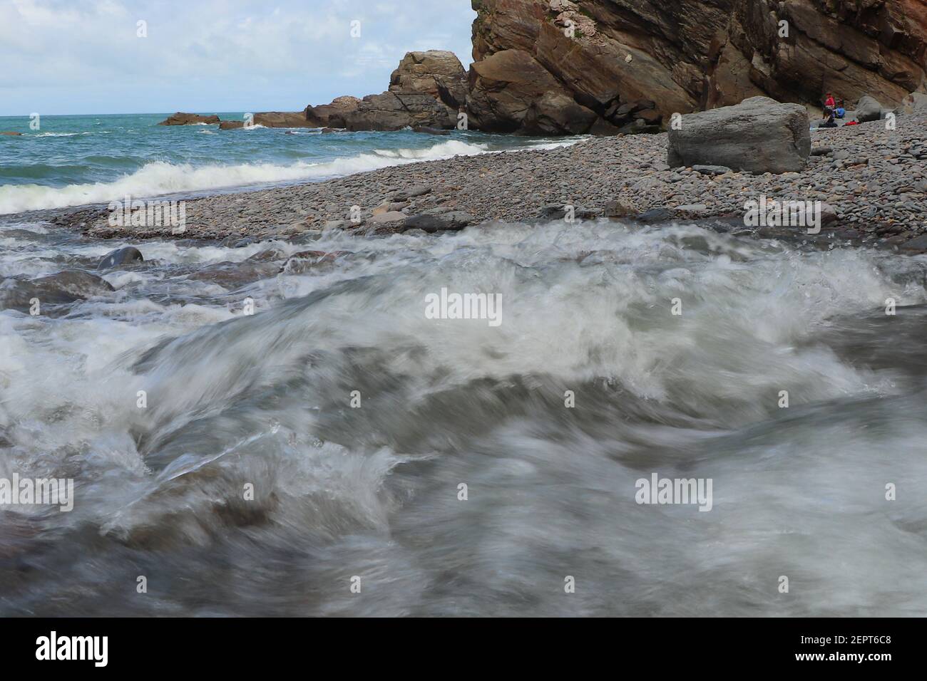 Heddon river flowing through the valley and over rocky ground Stock ...