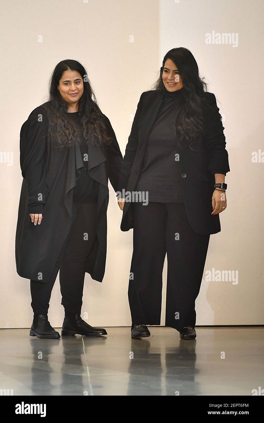 Designers Shaikha Noor Al Khalifa and Shaikha Haya Al Khalifa walk on ...
