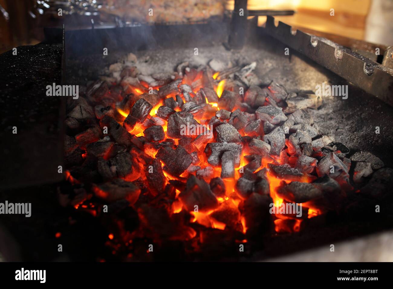 Igniting charcoal on barbecue grill hi-res stock photography and images ...