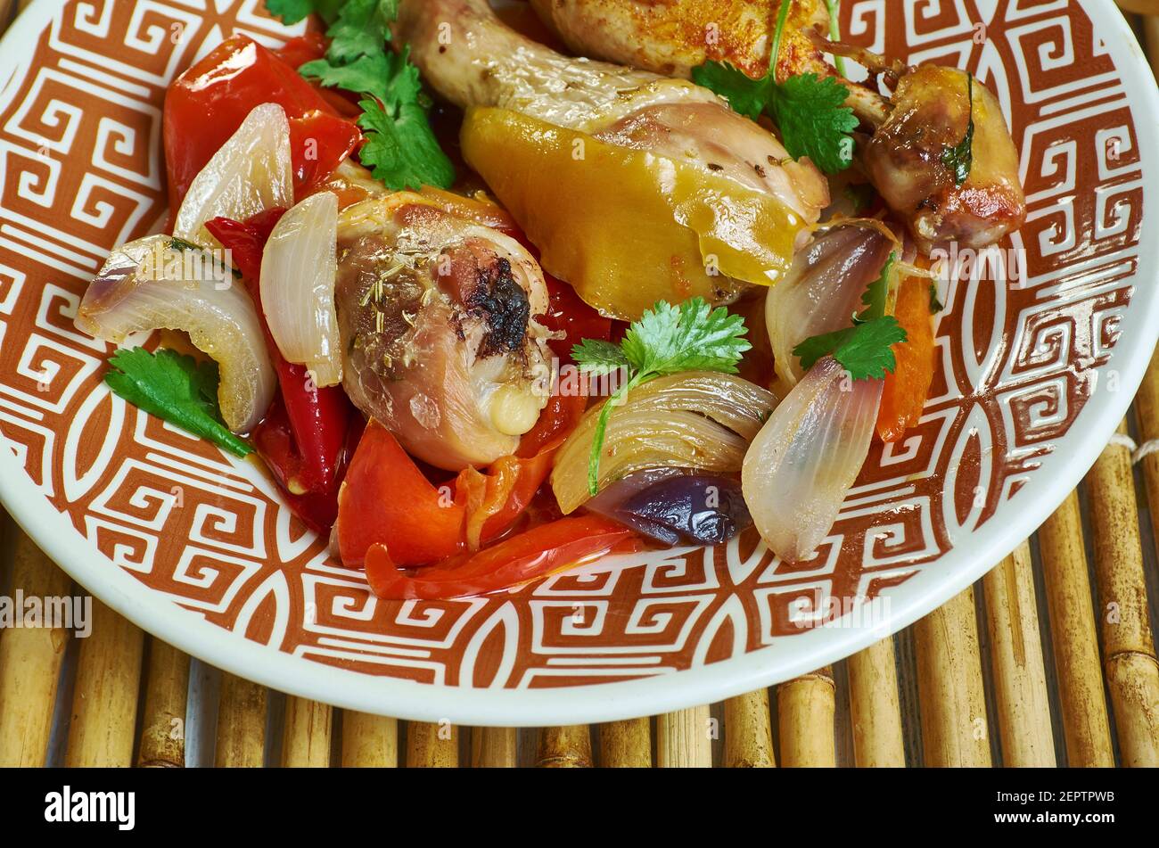 Pollo alla romana, age-old peasant dish from Rome Stock Photo - Alamy