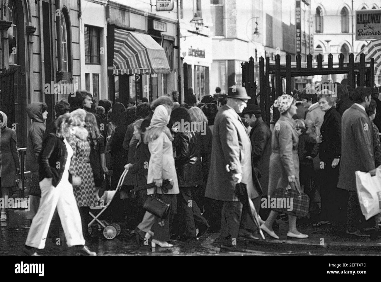 Shoppers walking past the fences protecting the town centre in Belfast ...