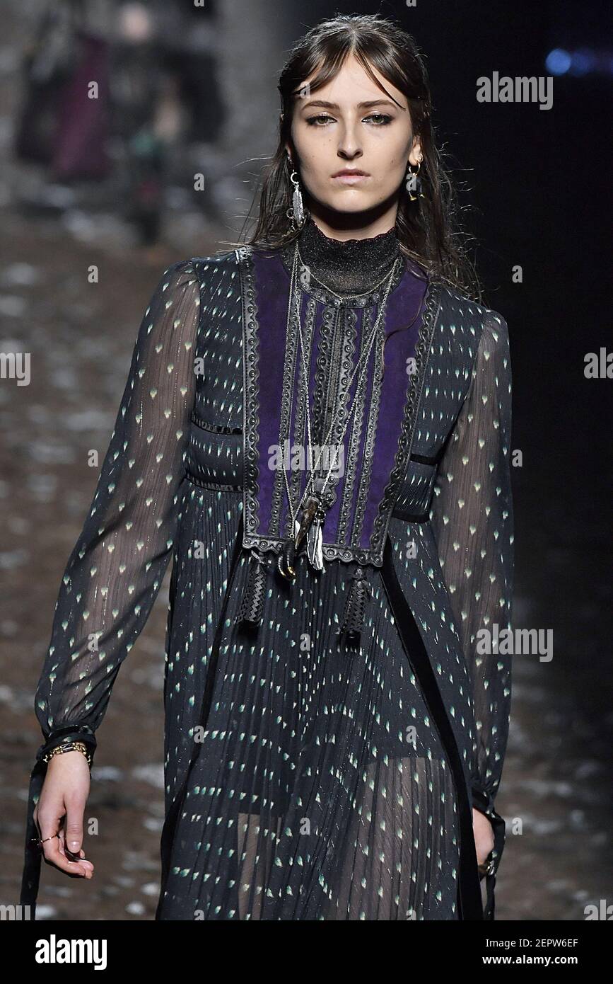 Model Anna Collins walks on the runway during the Coach Fashion Show ...