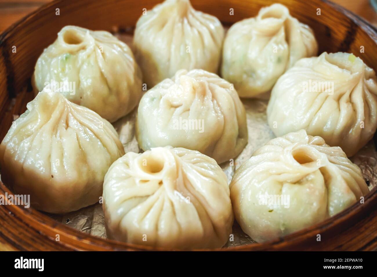 steamed dumplings in wooden basket Stock Photo - Alamy