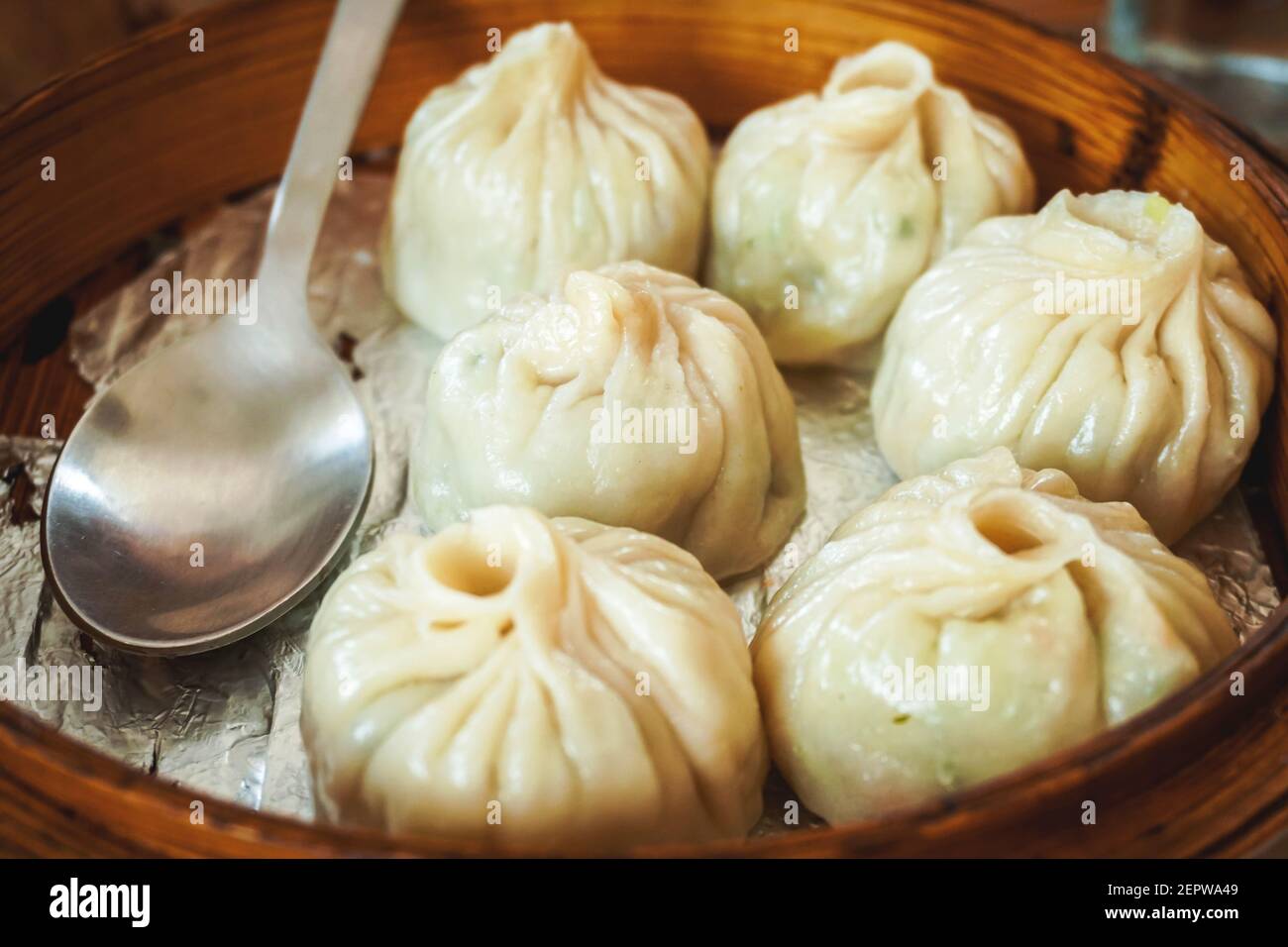 steamed dumplings in wooden basket Stock Photo - Alamy