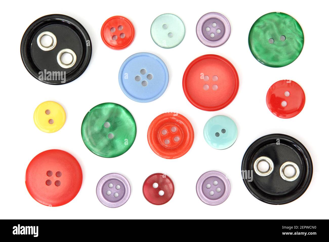 Set of different and colored sewing buttons, cut out and isolated on ...