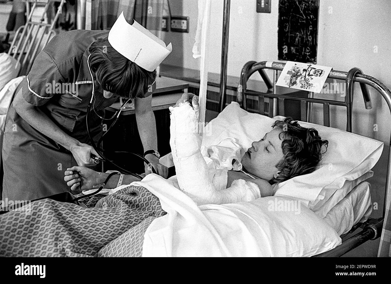 Childrens Ward Cardiff Hospital. Nurse taking blood pressure of child ...