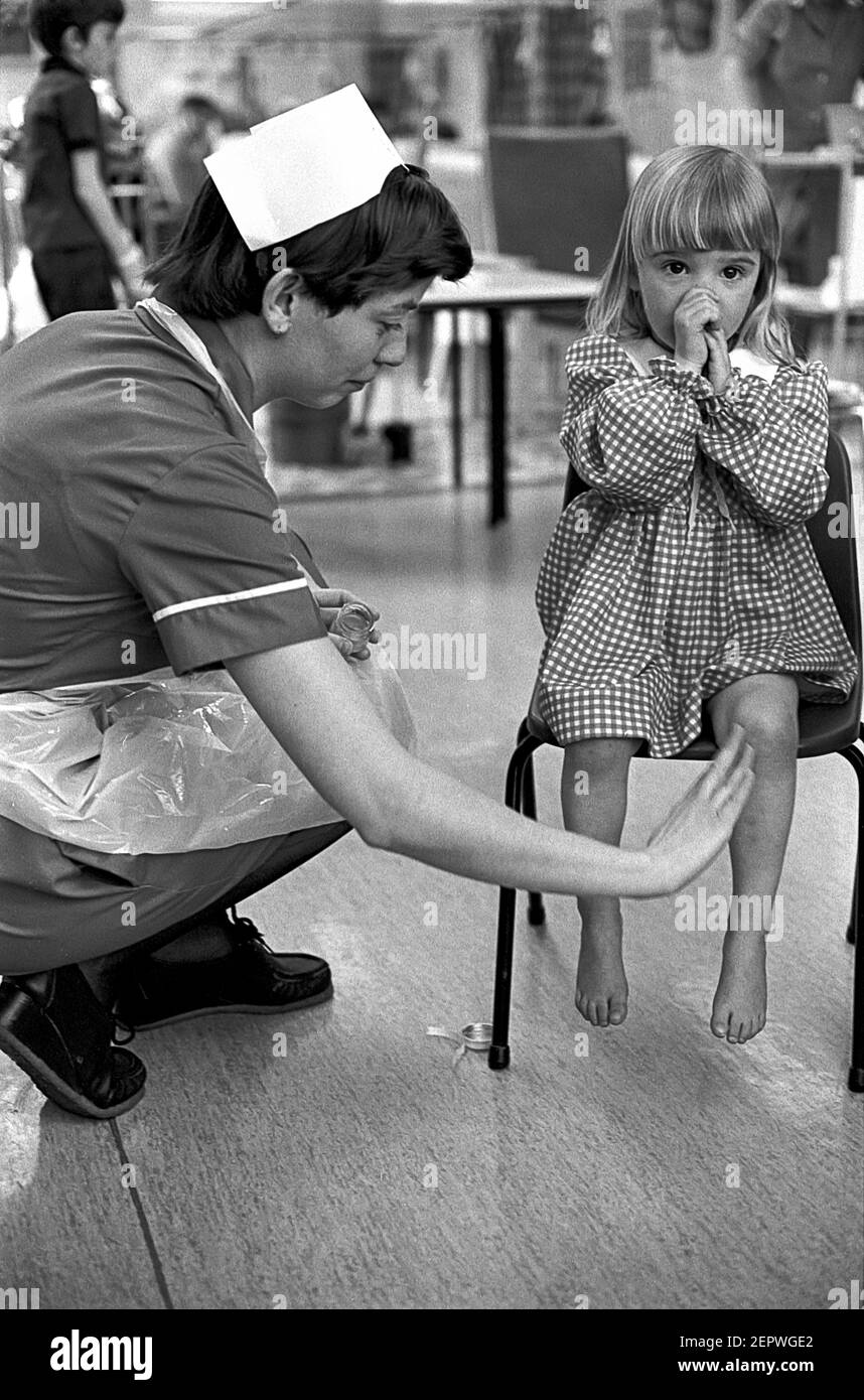 Childrens Ward Cardiff Hospital. Checking child's leg which had been ...