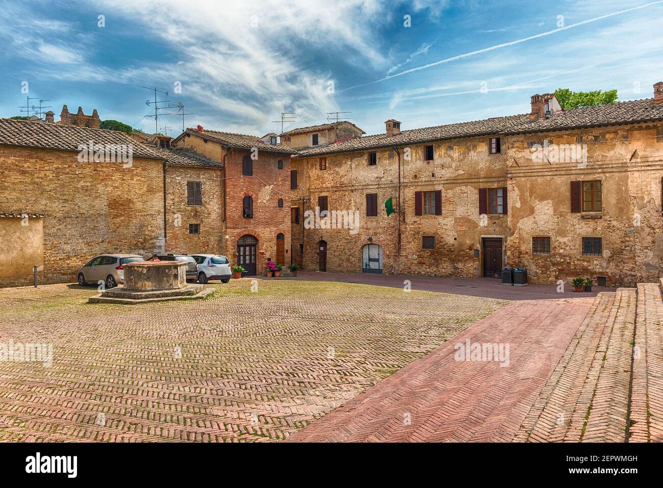 View of Sant'Agostino square in the medieval town of San Gimignano ...