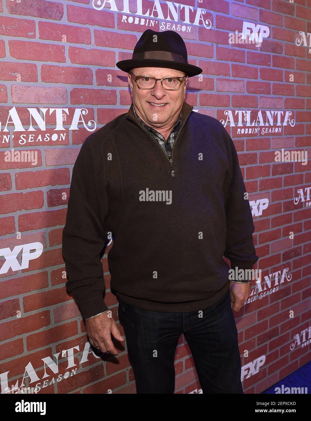 LOS ANGELES - FEBRUARY 19: Tom Lofaro arrives at the red carpet event ...