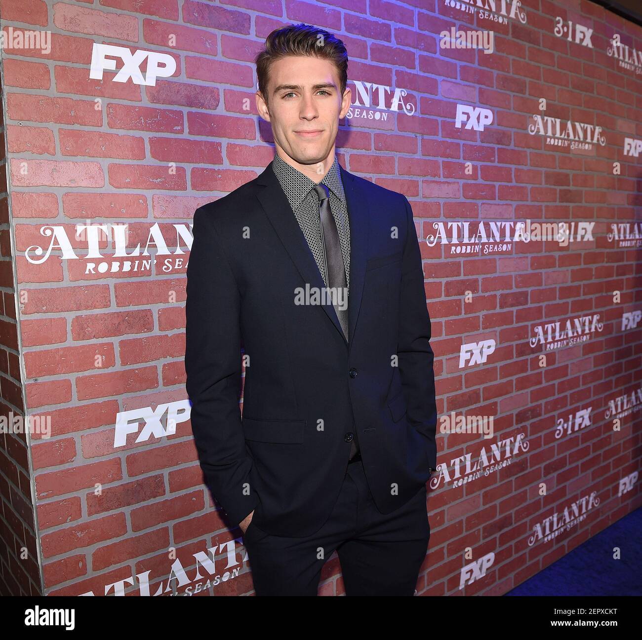 LOS ANGELES - FEBRUARY 19: Griffin Freeman arrives at the red carpet ...