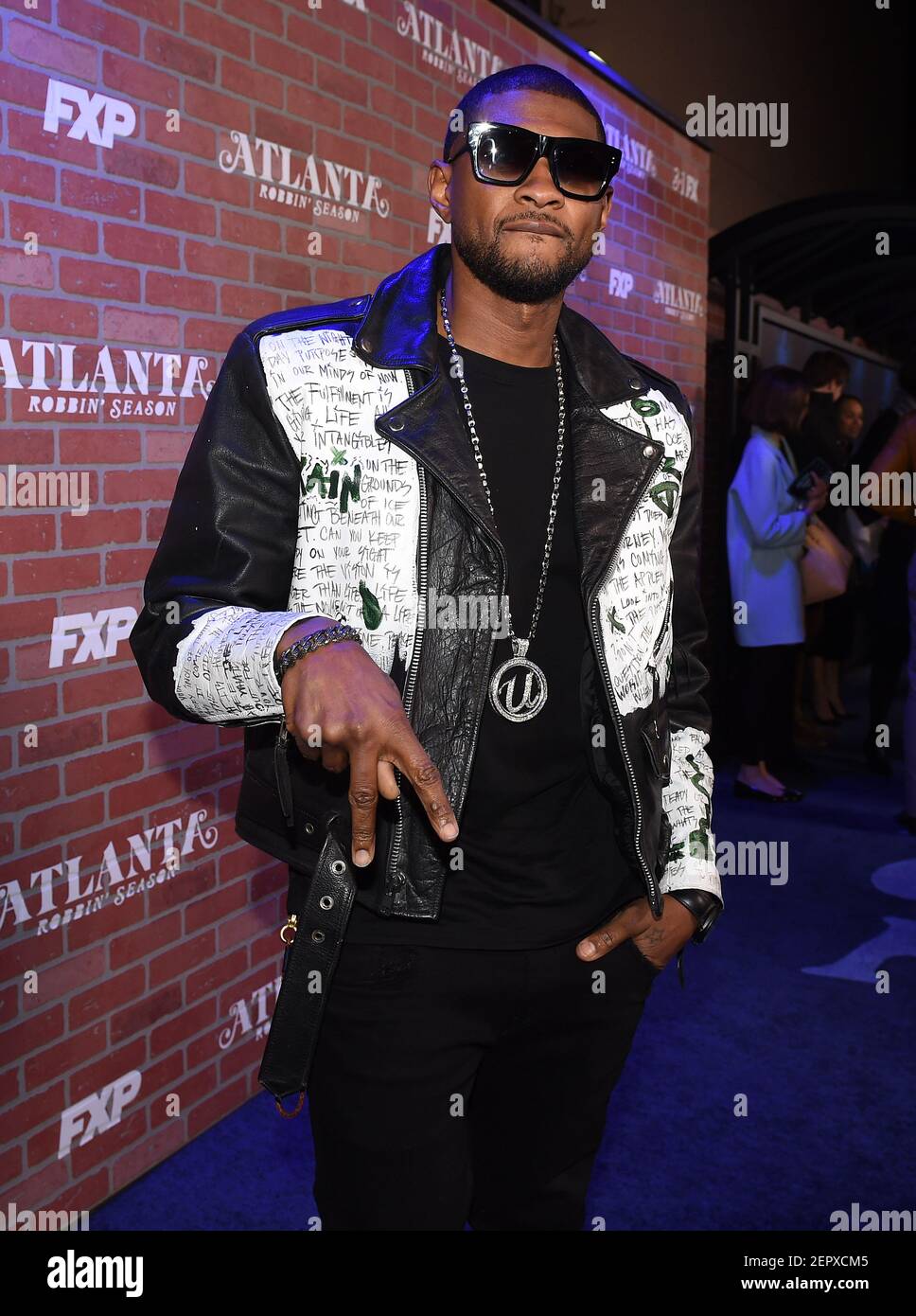 LOS ANGELES - FEBRUARY 19: Usher arrives at the red carpet event for FX ...