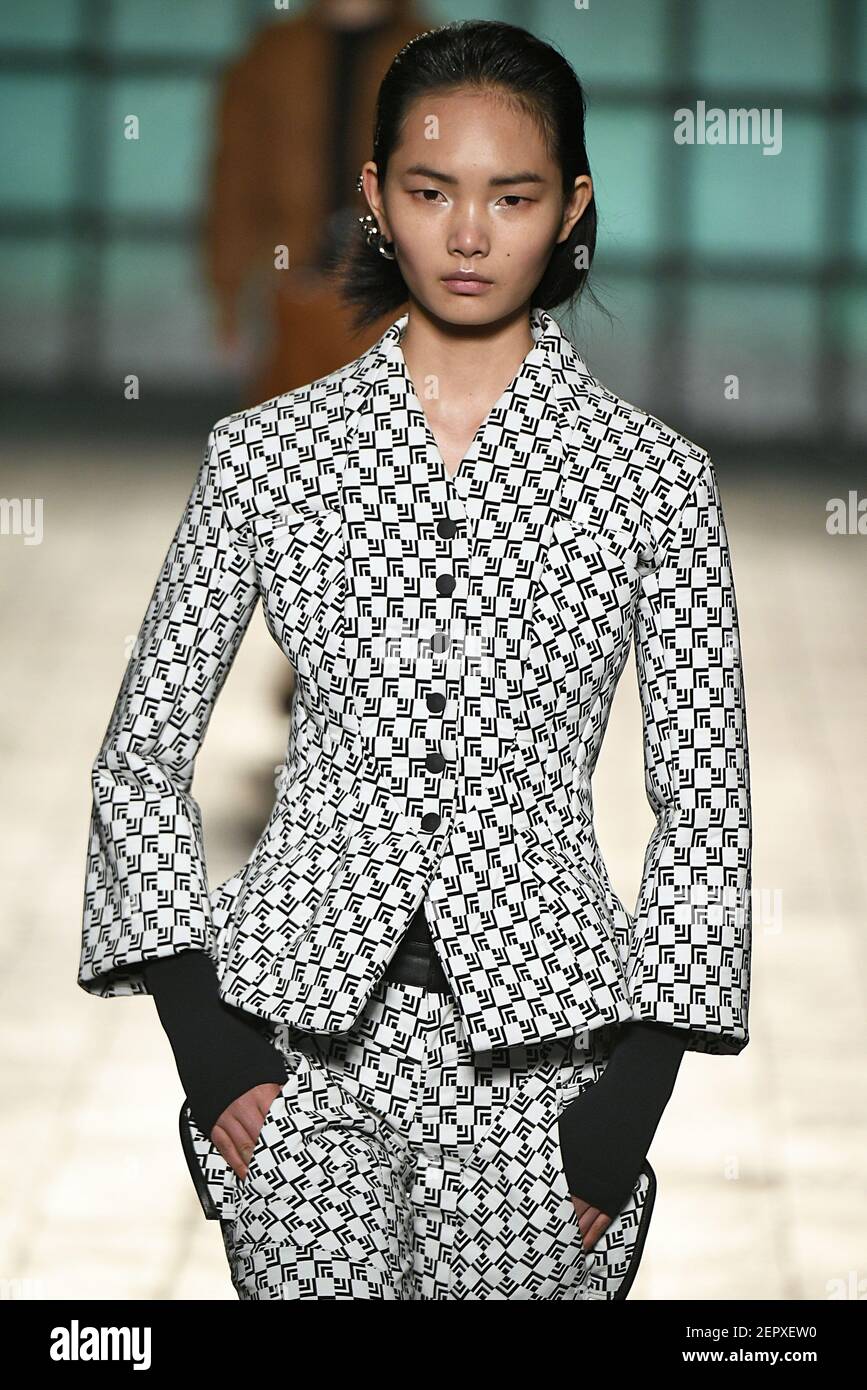 Model Ling Ling Chen walks on the runway during the Mary Zatrantzou ...