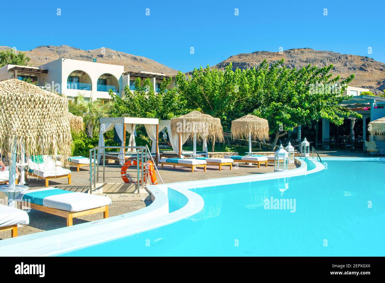 Rhodes, Greece - 18 July 2019: Outdoor pool area in a luxury hotel on ...