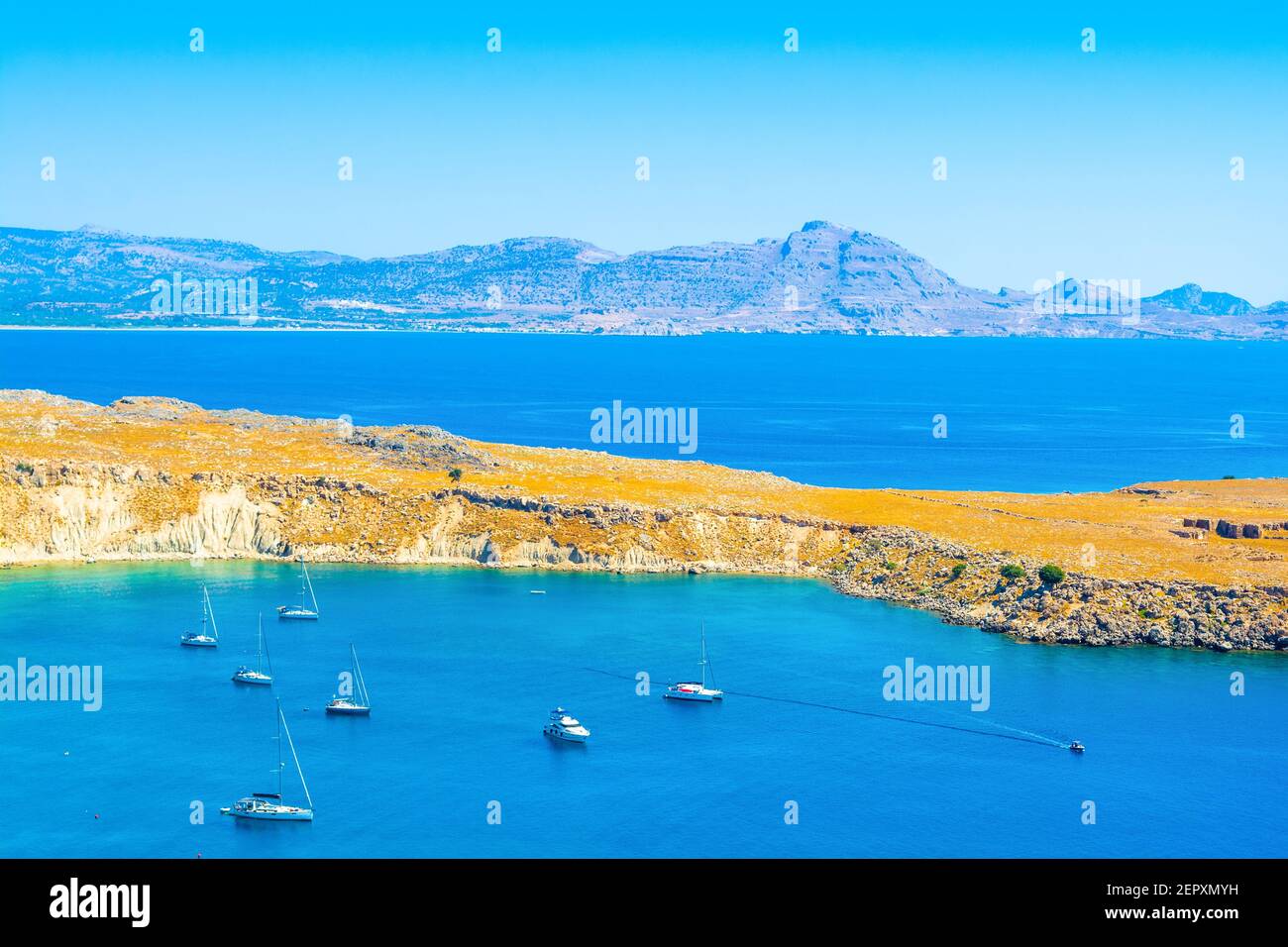 Beautiful mediterranean landscape of Lindos Bay on the Rhodes island ...