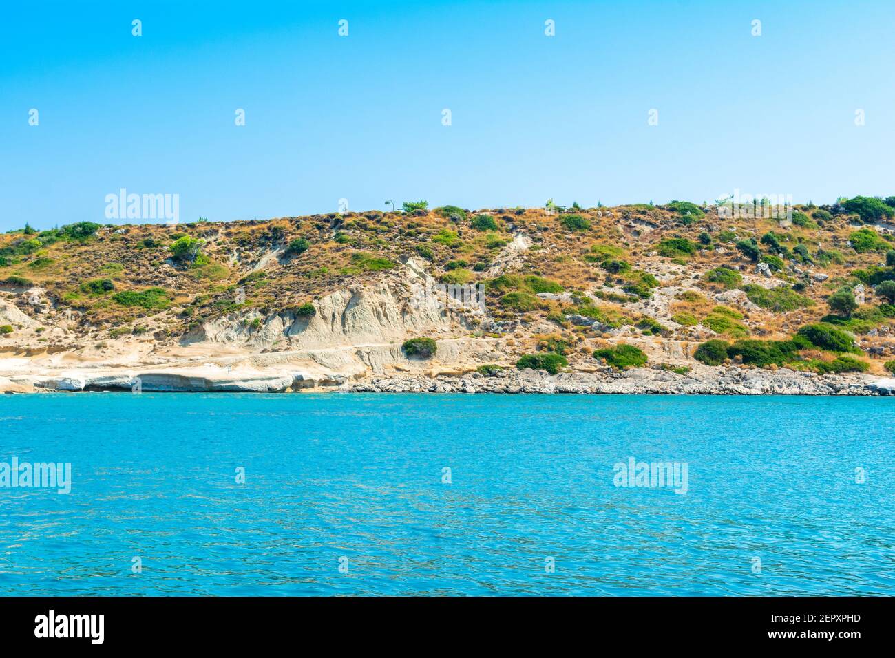 Landscape of beautiful Kolymbia bay in Rhodes island with mountain and ...